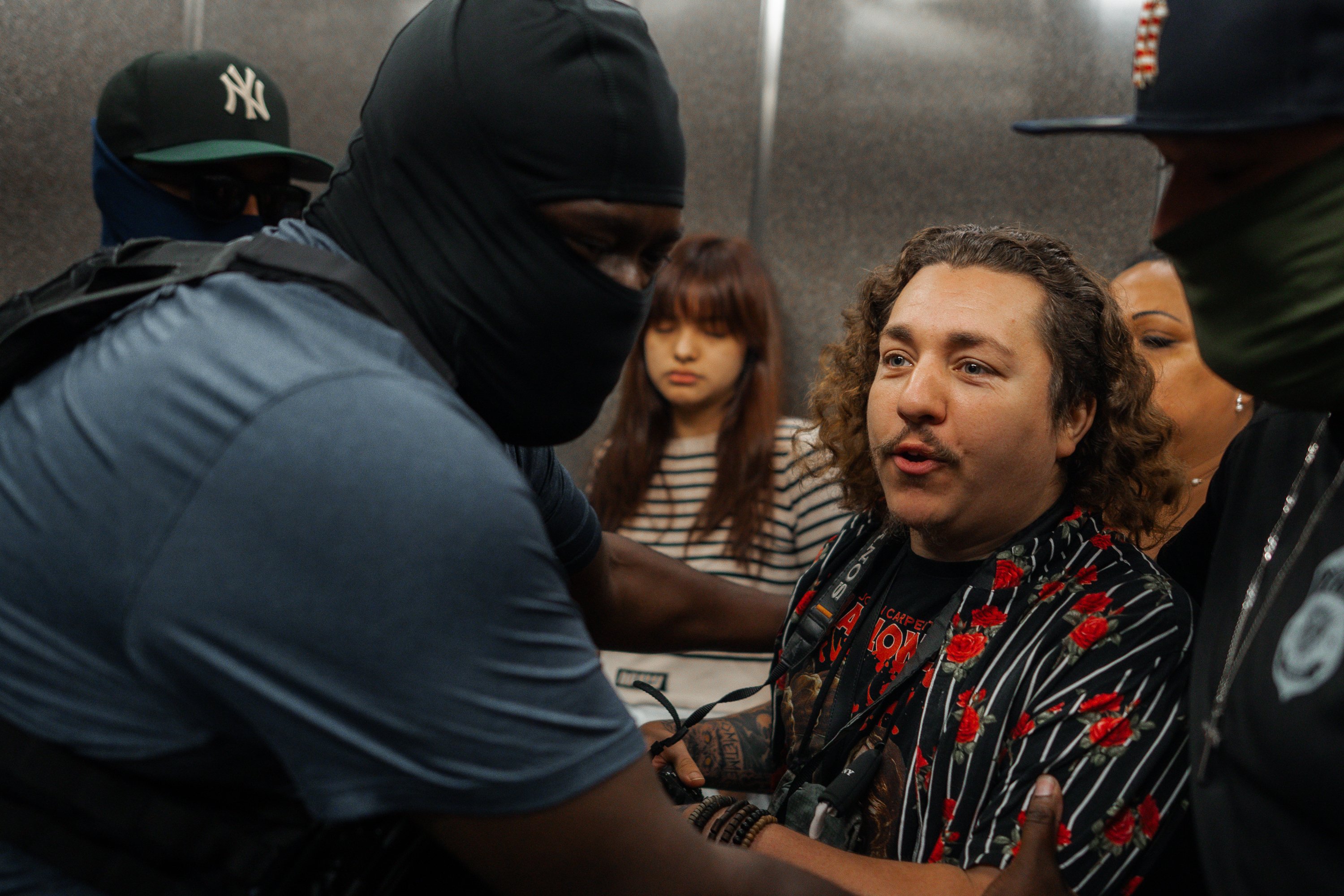 Reporter shoved by federal officers outside immigration court in NYC ...