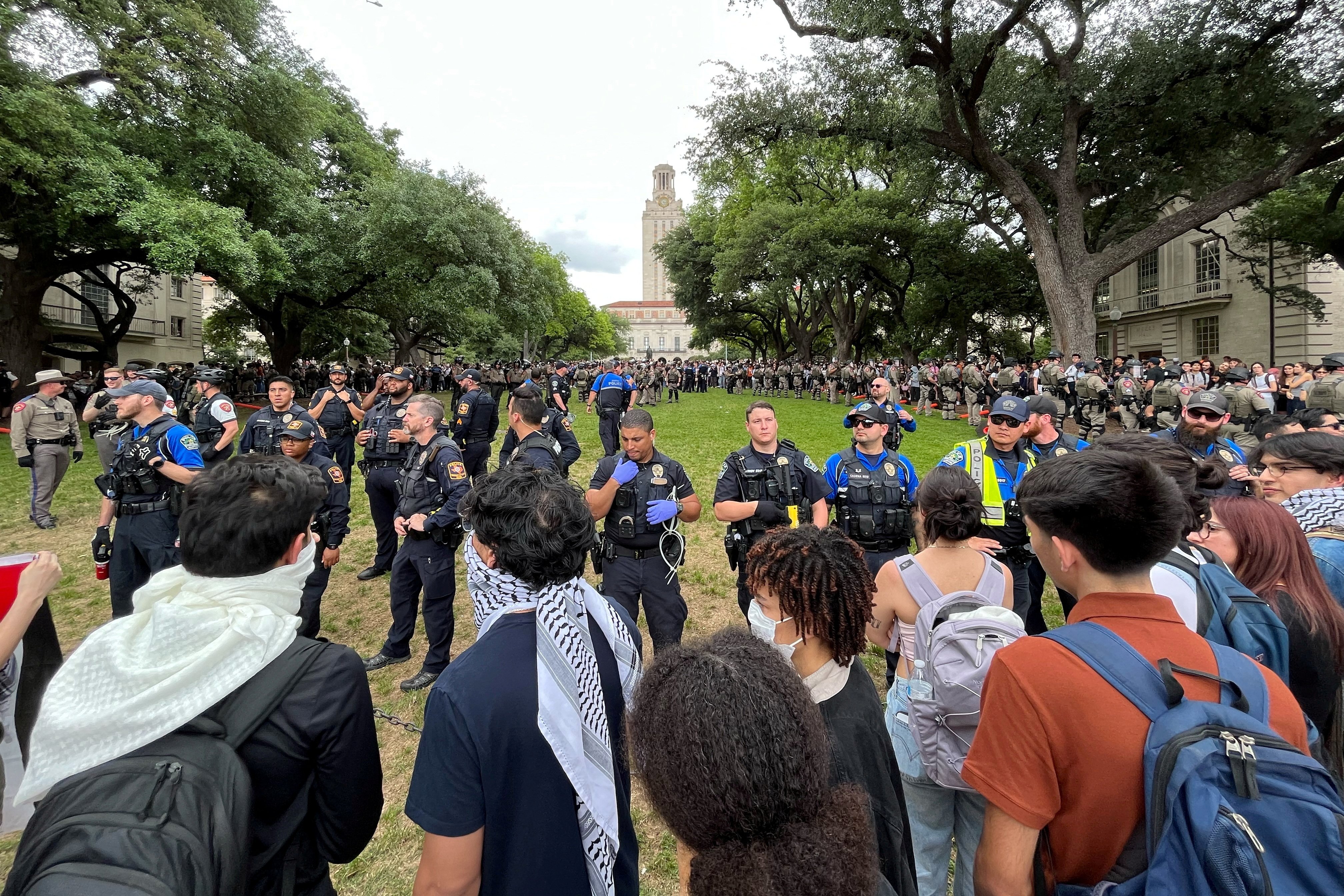 Student photojournalist knocked down by police at UT Austin protest - U ...