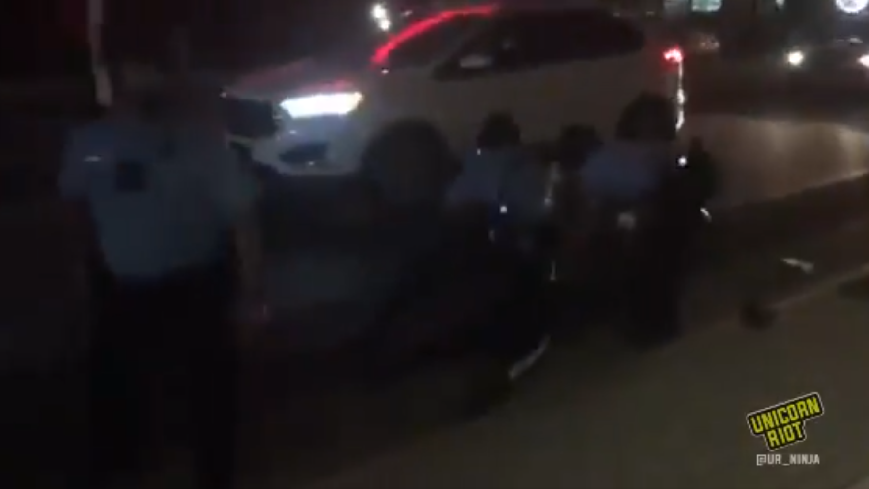 Police officer strikes Unicorn Riot journalist’s phone with baton - U.S ...